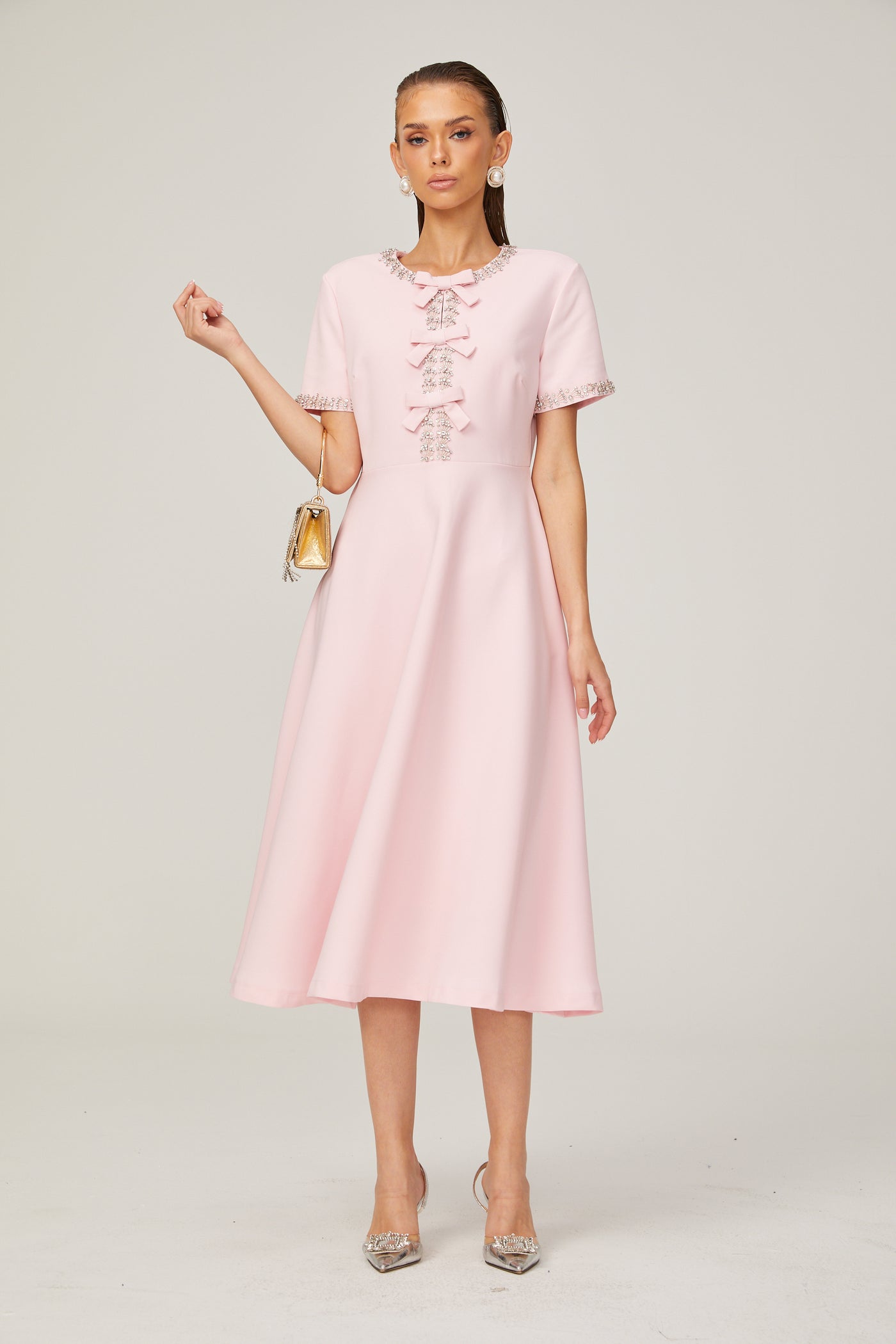 Cassiopeia crystal-accented pink bow midi dress