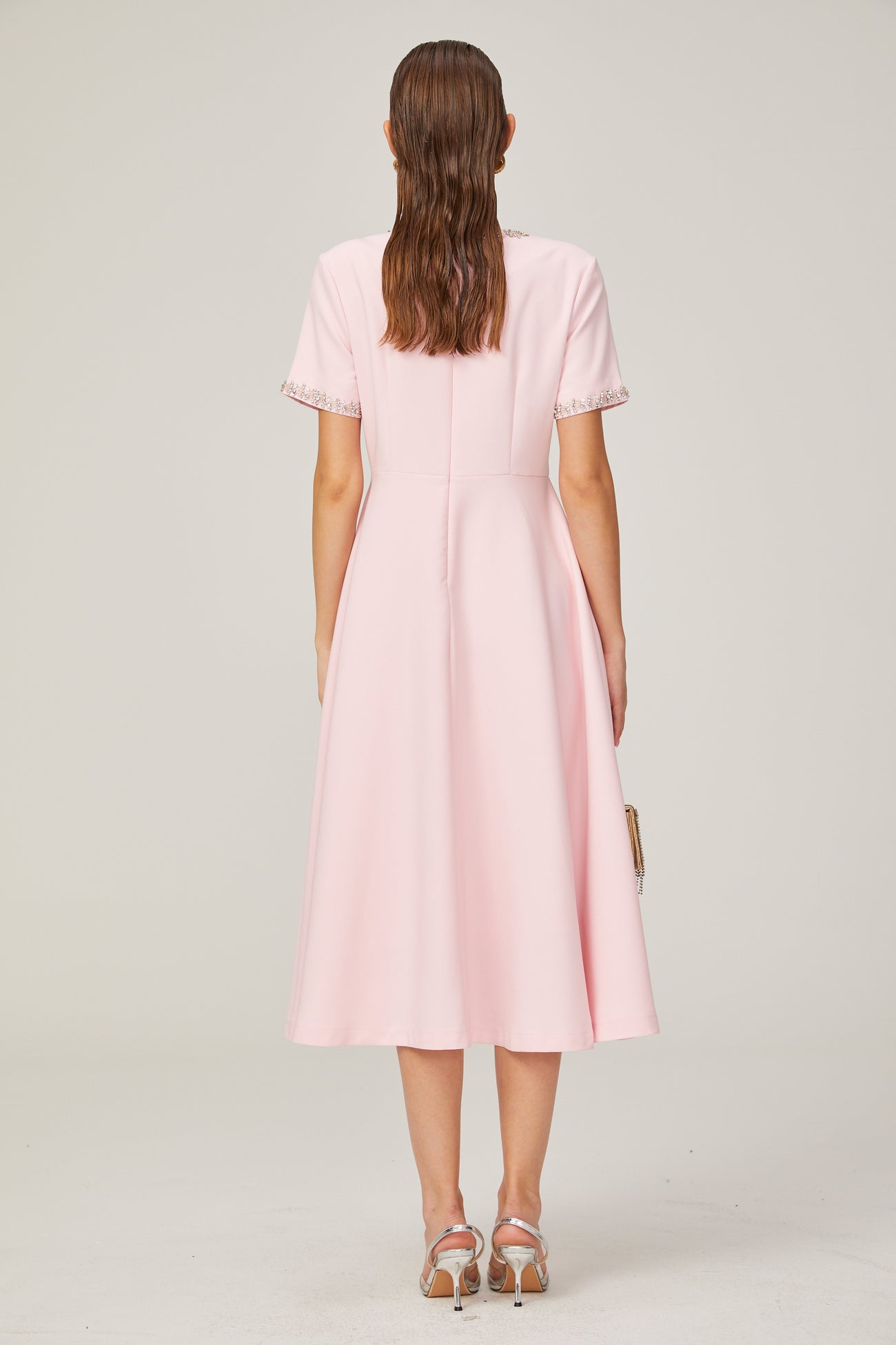 Cassiopeia crystal-accented pink bow midi dress